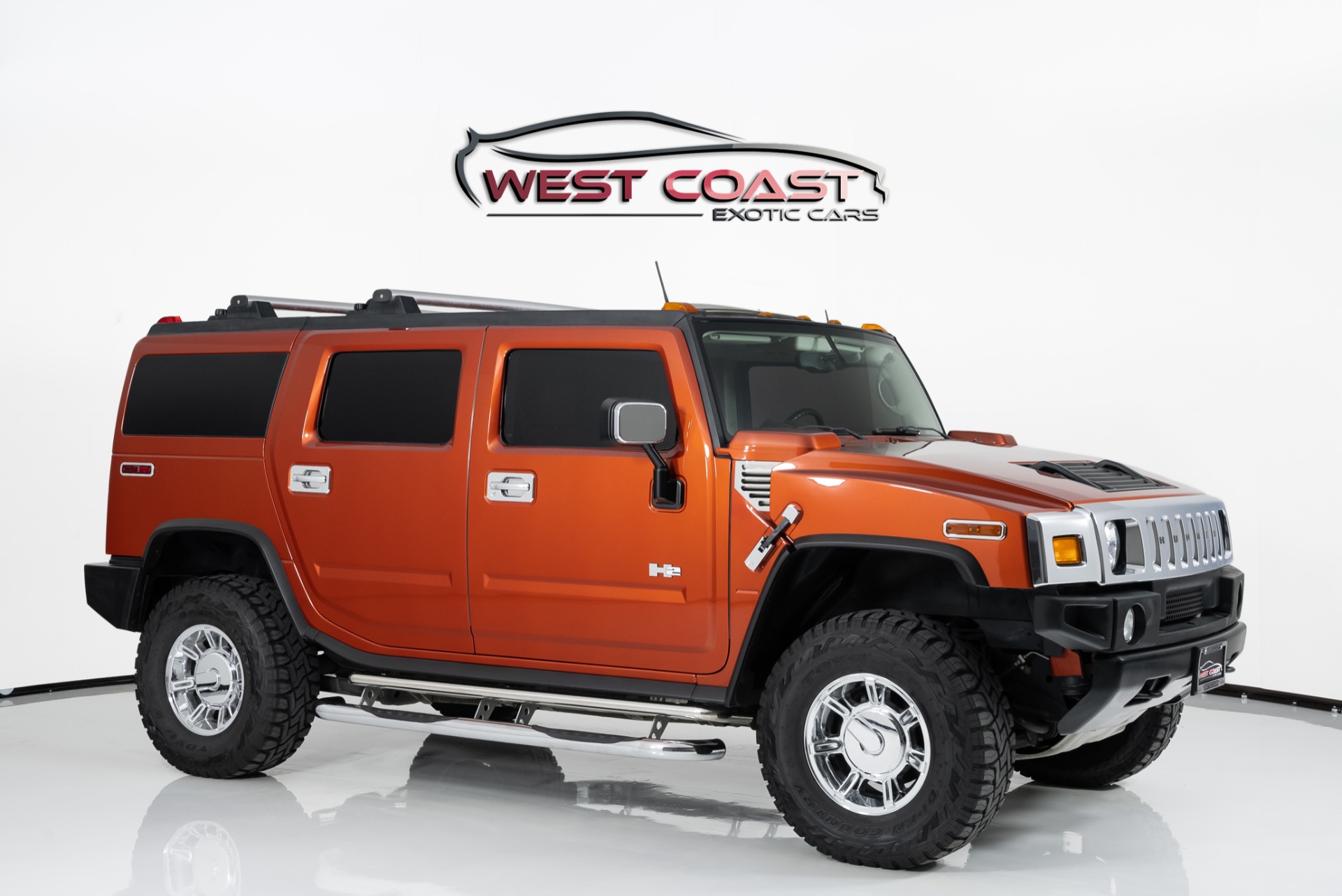 Orange Hummer H2 Truck